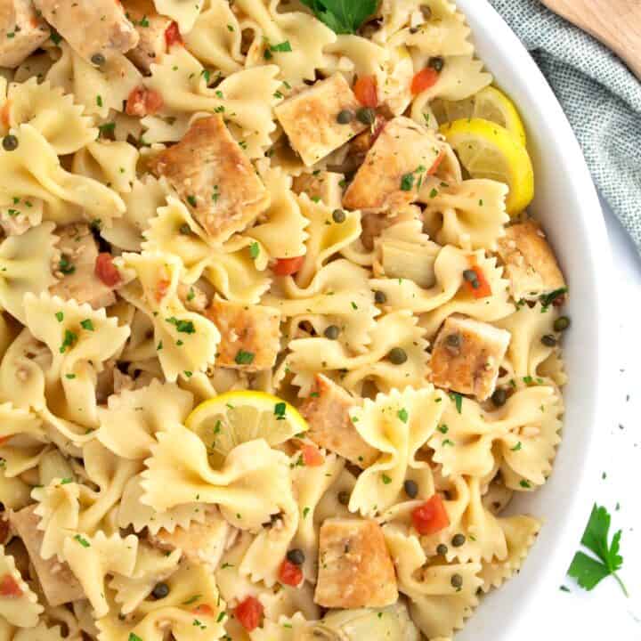 Easy Chicken Piccata Pasta w/ Tomatoes and Artichokes - Borrowed Bites