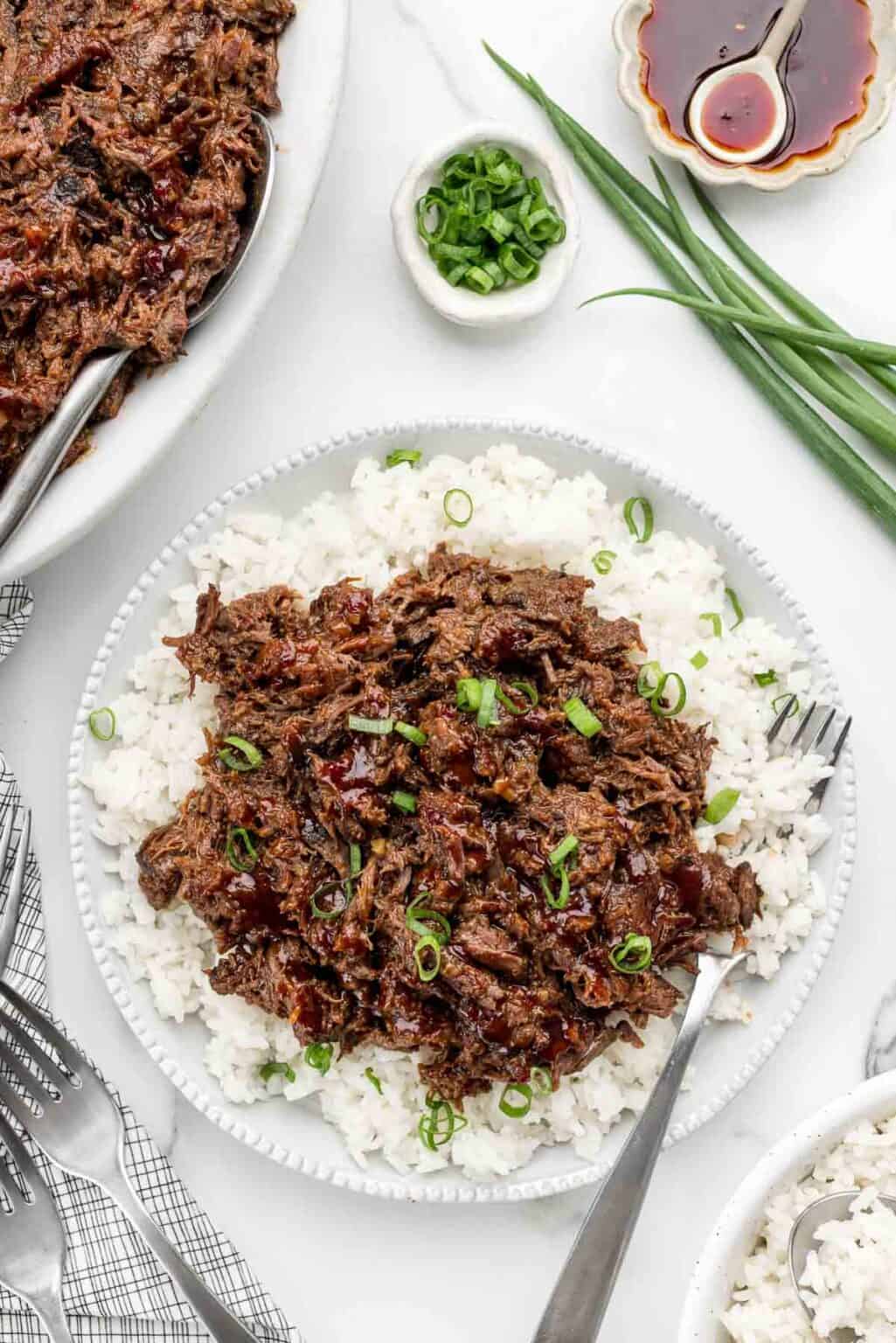 Slow Cooker Korean Beef (Sweet & Sticky Gochujang Sauce) - Borrowed Bites